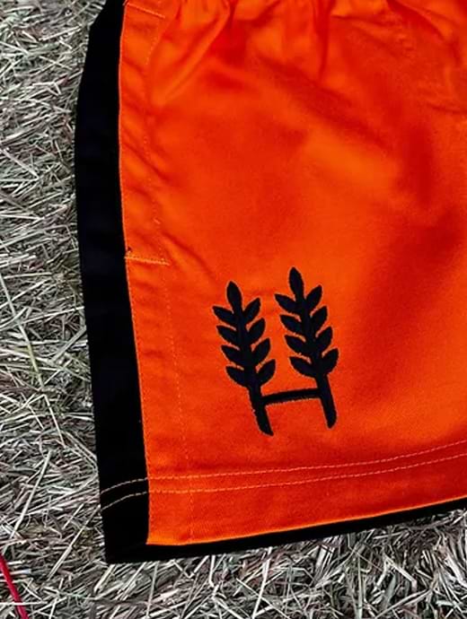 Hexby Unisex Harlequin Shorts Orange/Black